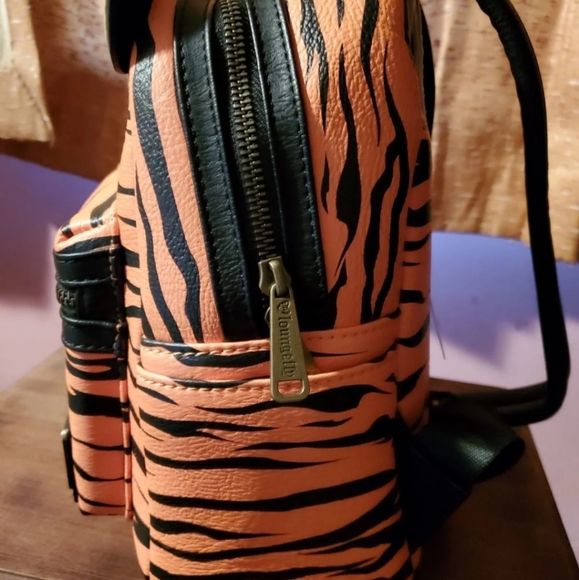 Loungefly | Bags | Tigger Loungefly Backpack Original Loungefly Logo ...